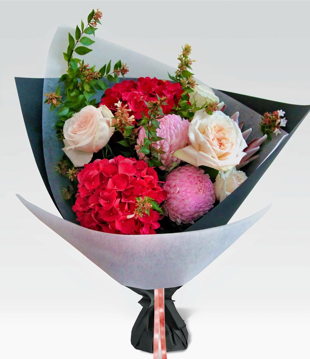Get Lavish Ruby Rose Flower Bouquet Online At Best Price